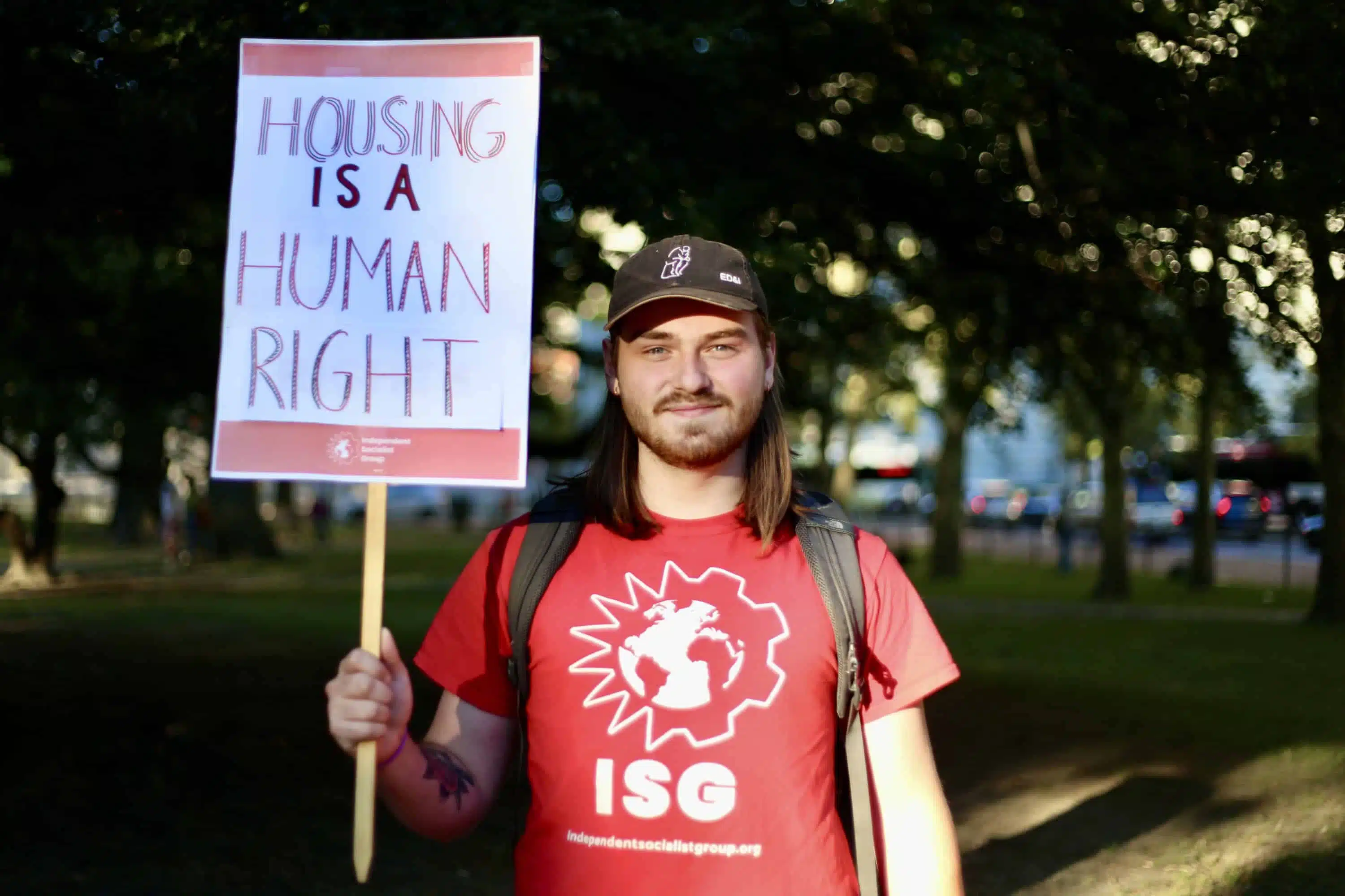 Protest Challenges Taxpayer Funding for Luxury Apartments Instead of ...